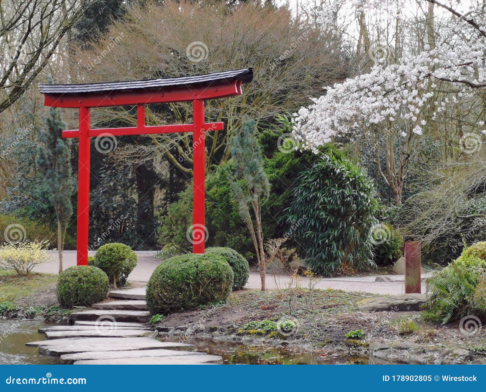 Red Metal Arch in the Park Surrounded by Trees Stock Image - Image of ...