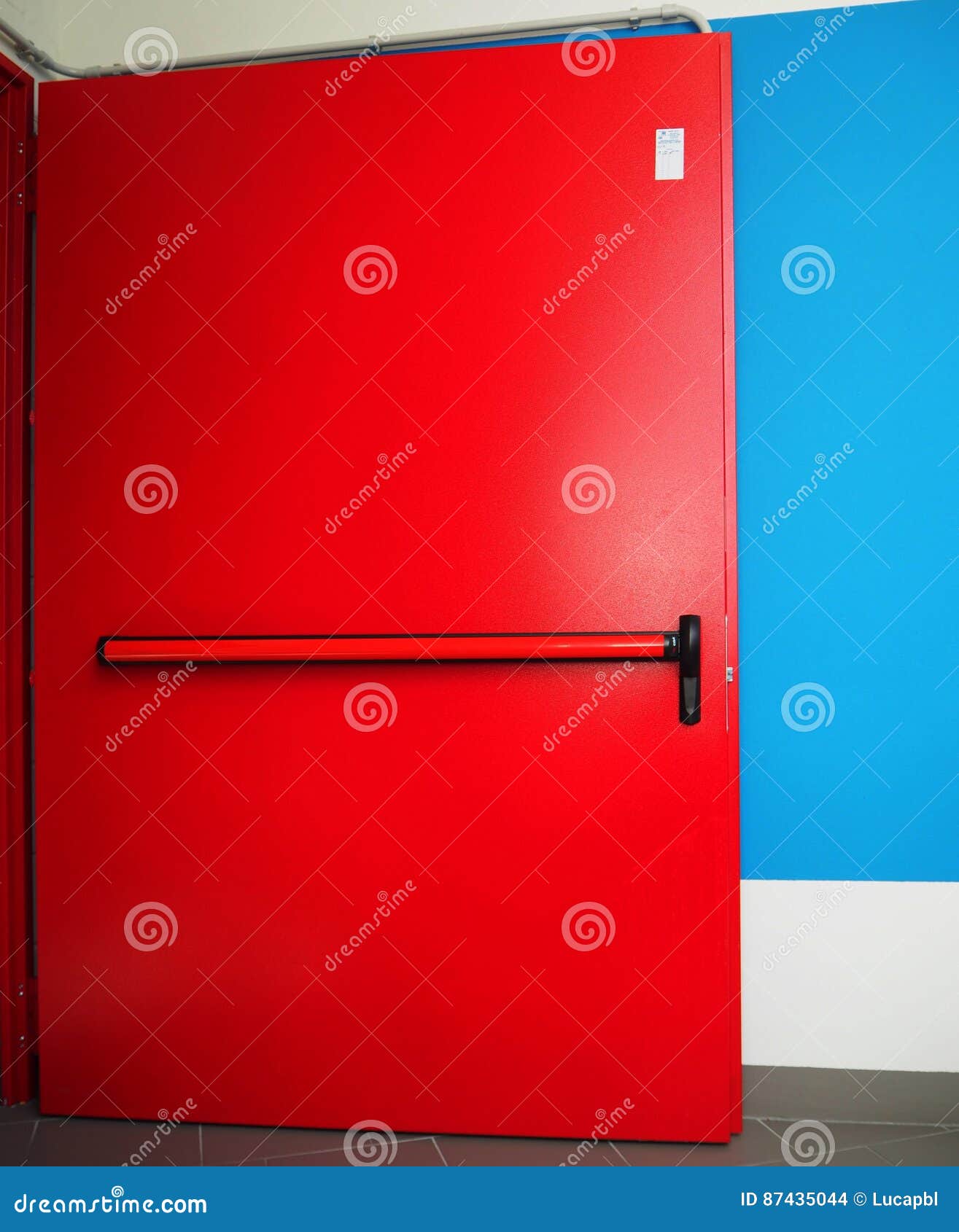 Red metal door stock photo. Image of doors, industrial - 87435044