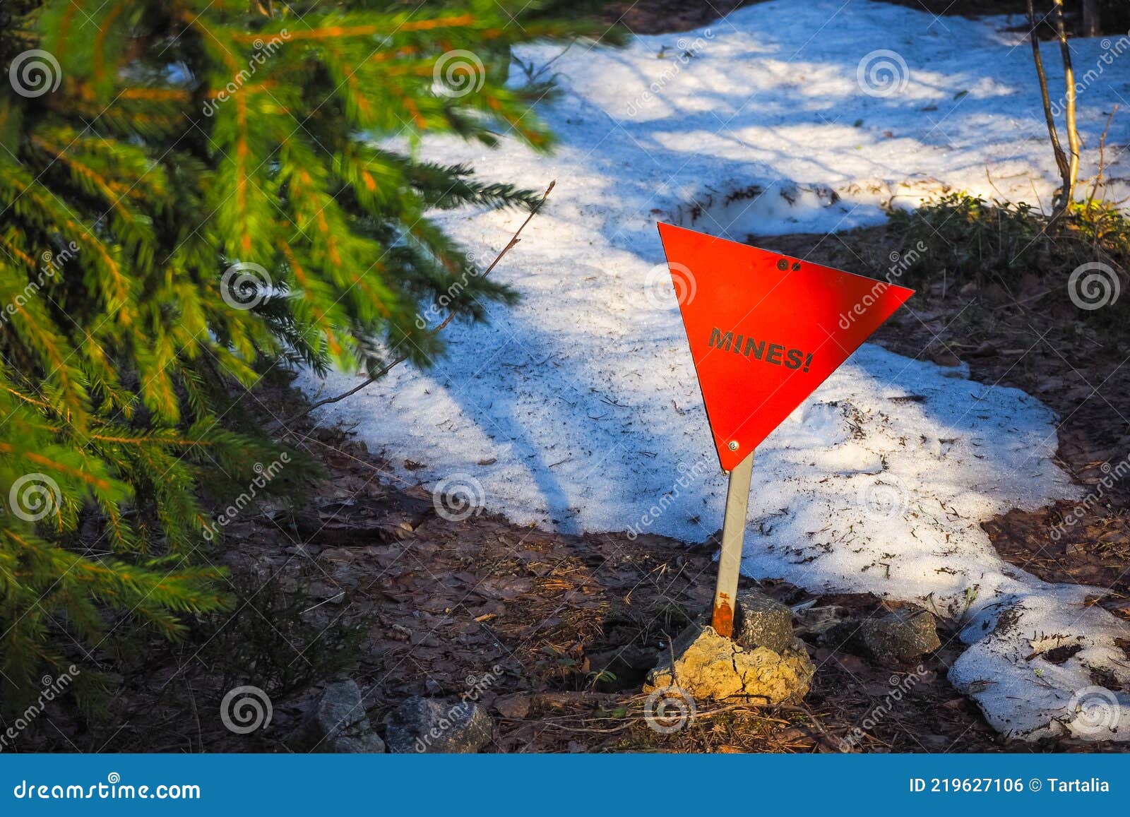 Red Metal Triangle Sign in the Forest Bewaring of Mines Stock Photo ...