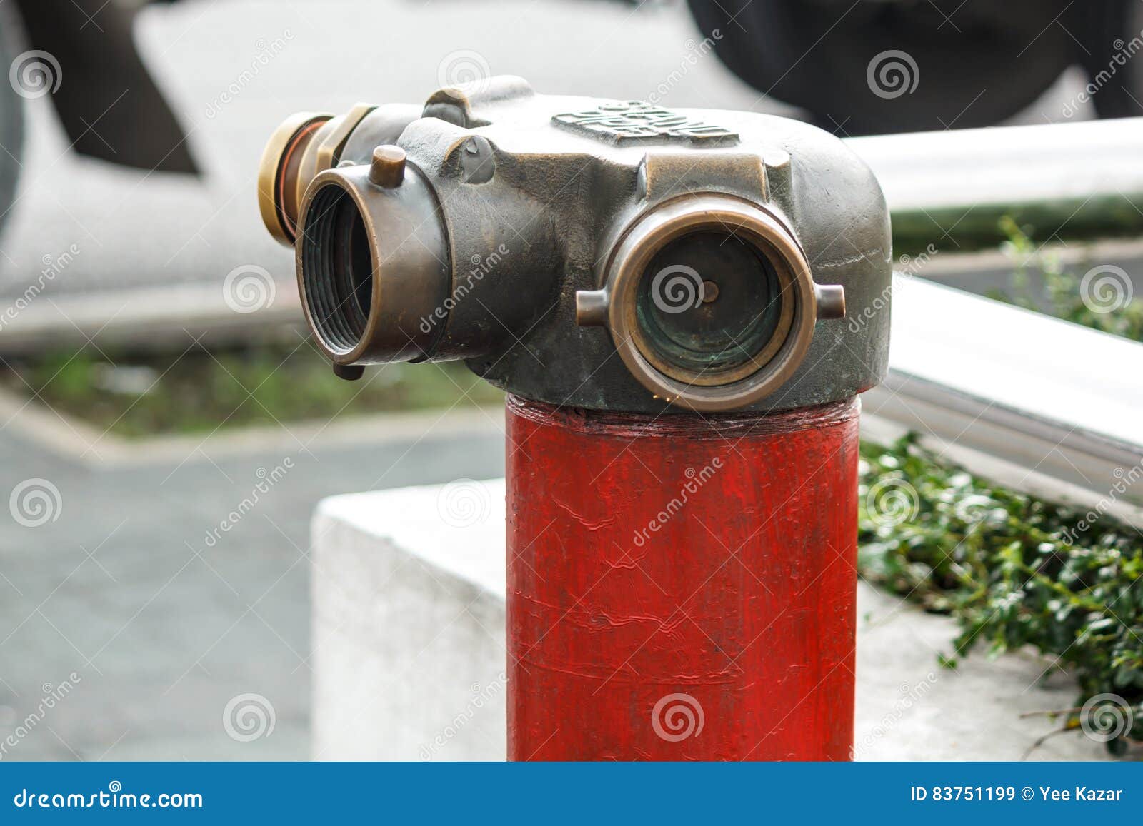 Red Metallic Fire Hydrant or Fire Department Connection on Street Stock ...