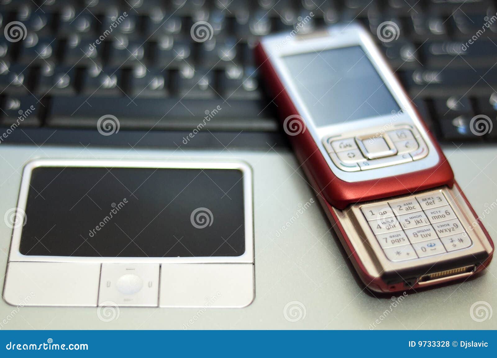 Red mobile slider phone stock photo. Image of buttons - 9733328