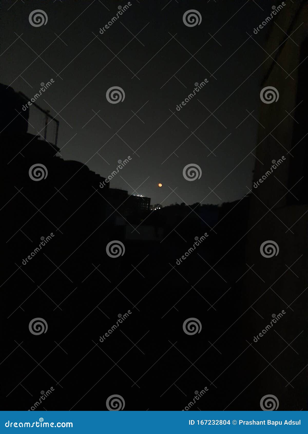 Red moon in dark shadow stock photo. Image of distance - 167232804