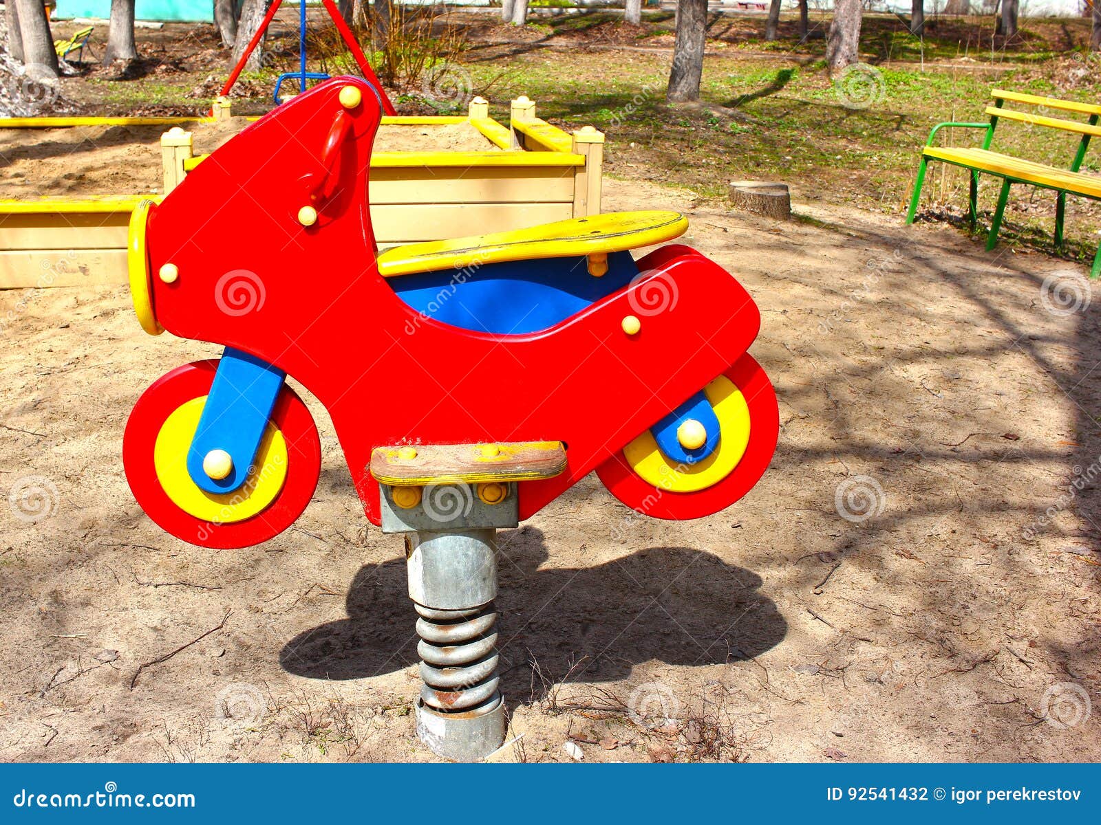 Red Motorcycle, Children`s Playground in the Spring Stock Photo - Image ...