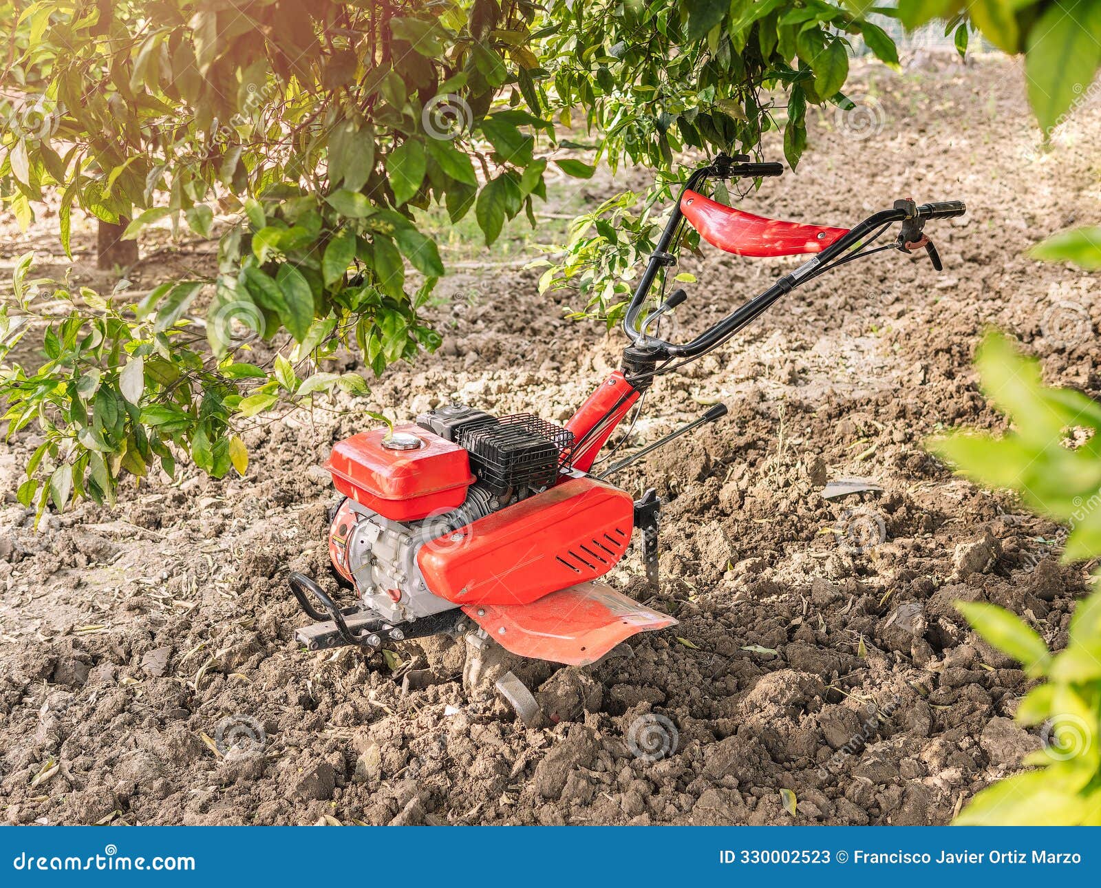 Red Motorized Tiller in Action on Farm Stock Image - Image of ...