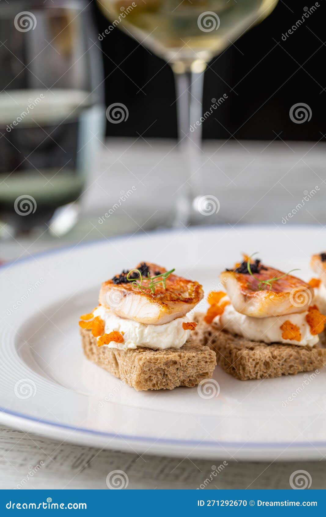 Red Mullet with Mash Sauce on Slices of Bread in Fine Dining Restaurant ...