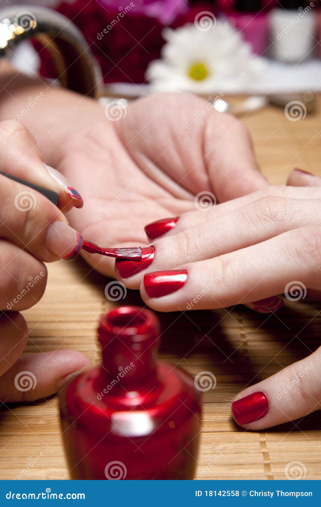 Red nail polish stock photo. Image of fingernails, applying - 18142558