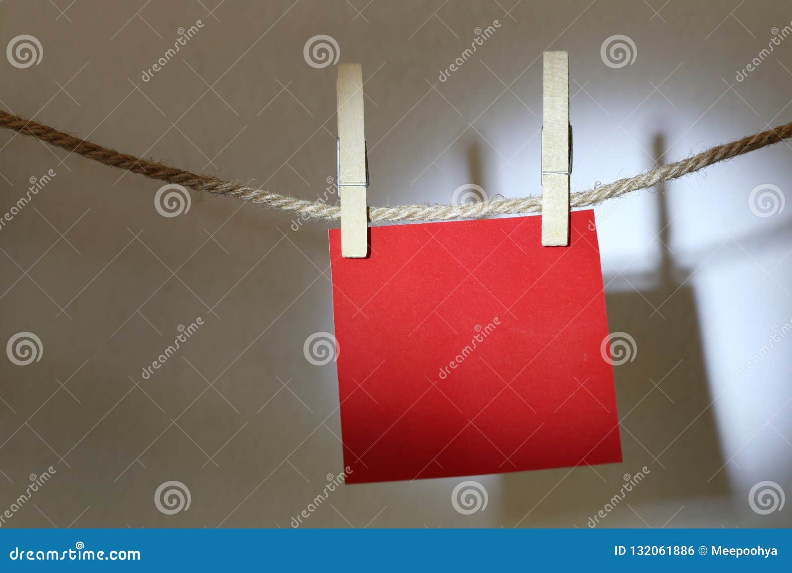Red Note Paper Hanging on Rope on White Wall Stock Photo - Image of ...