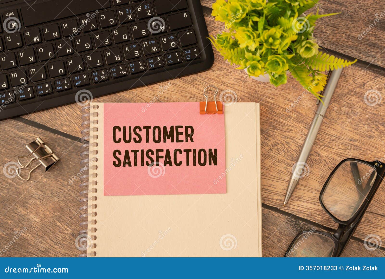 On a Red Notepad a Sheet of Paper with Text Customer Satisfaction Stock ...