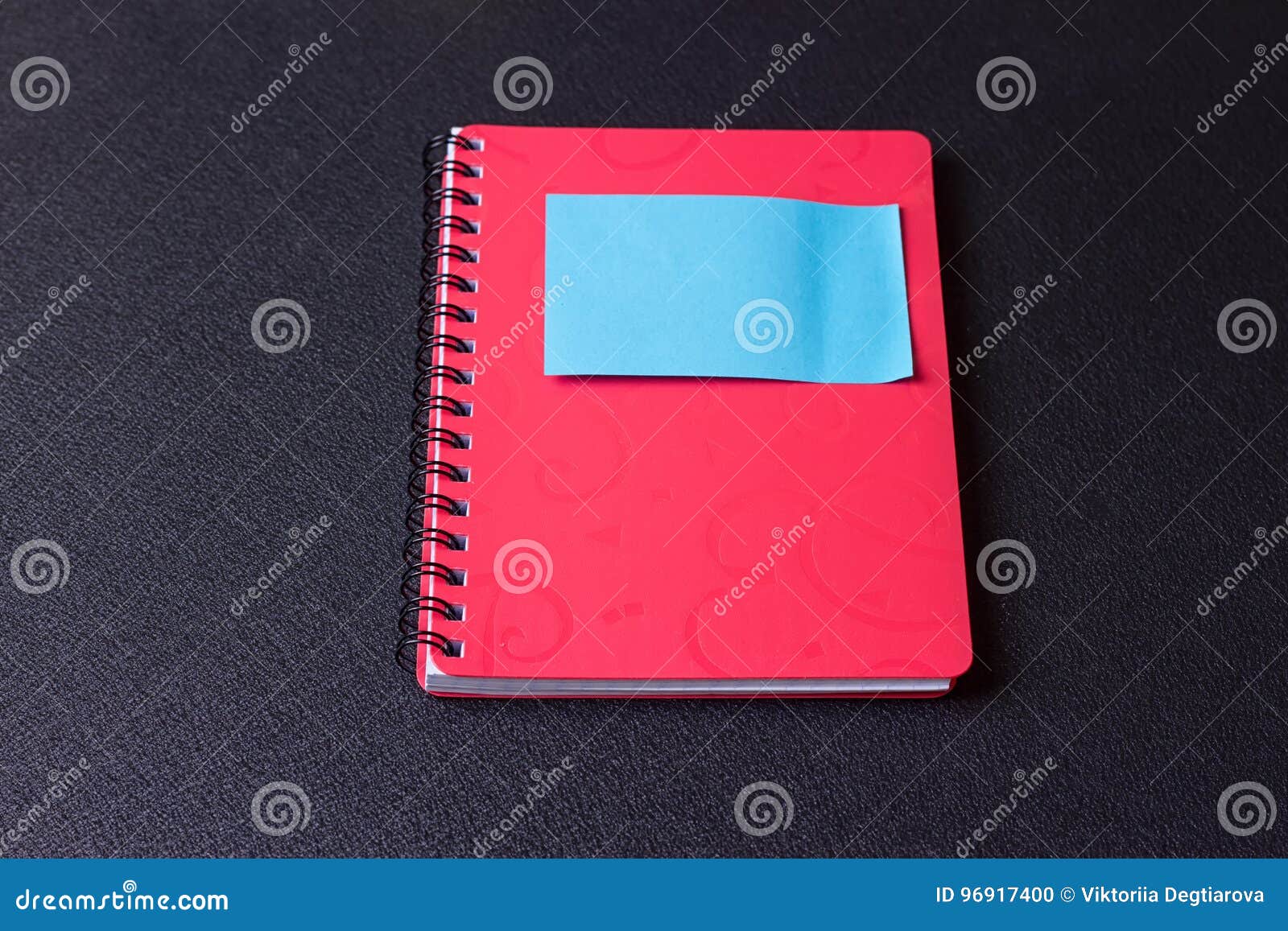 Red Notepad on a Spiral with a Sticker Stock Photo - Image of black ...