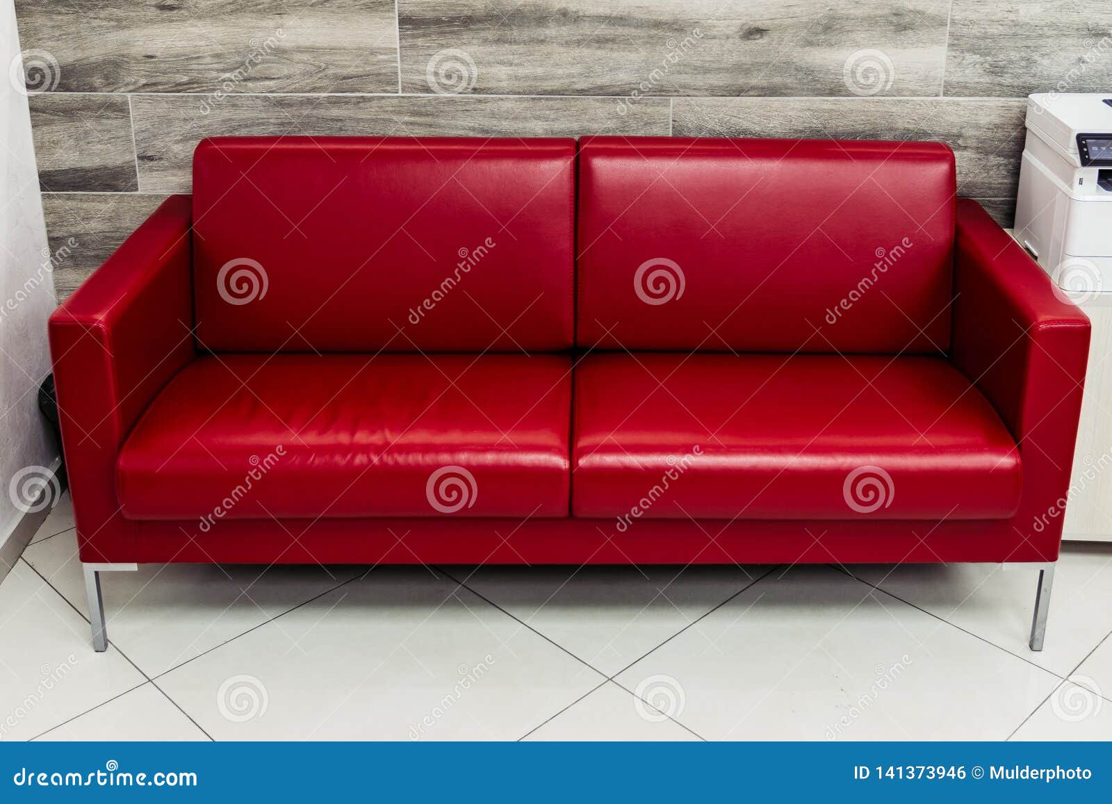Red office sofa stock photo. Image of building, lifestyle - 141373946