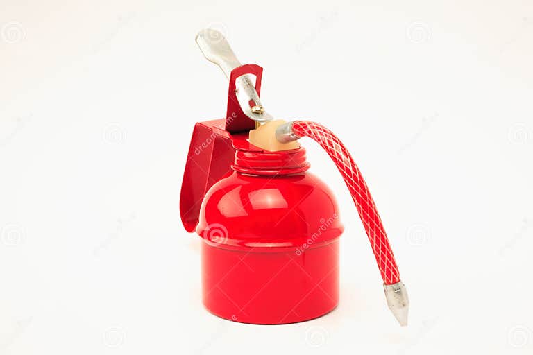 A Red Oil Can on a White Surface Stock Photo - Image of close, mechanic ...