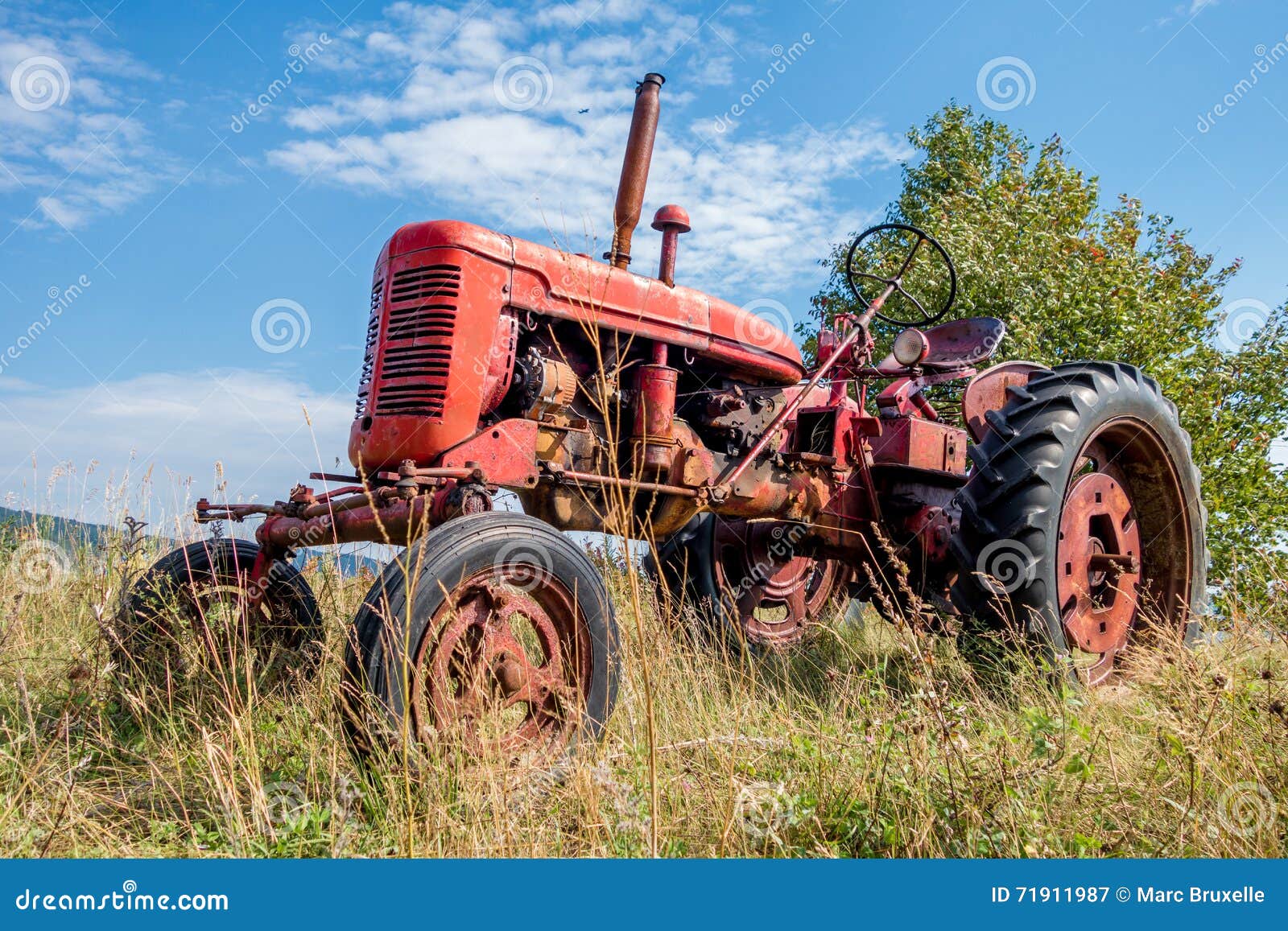 Red old rusty tractor stock image. Image of tractors - 71911987