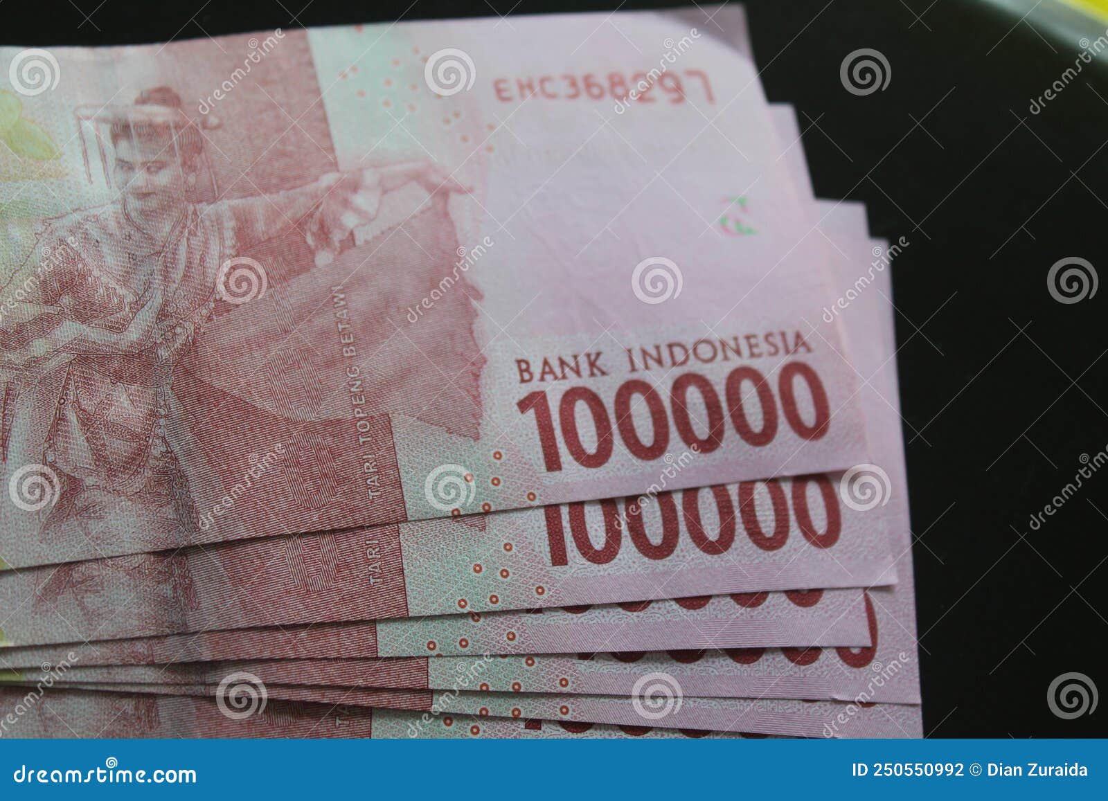 Red One Hundred Thousand Rupiah Stock Photo - Image of finance, paper ...