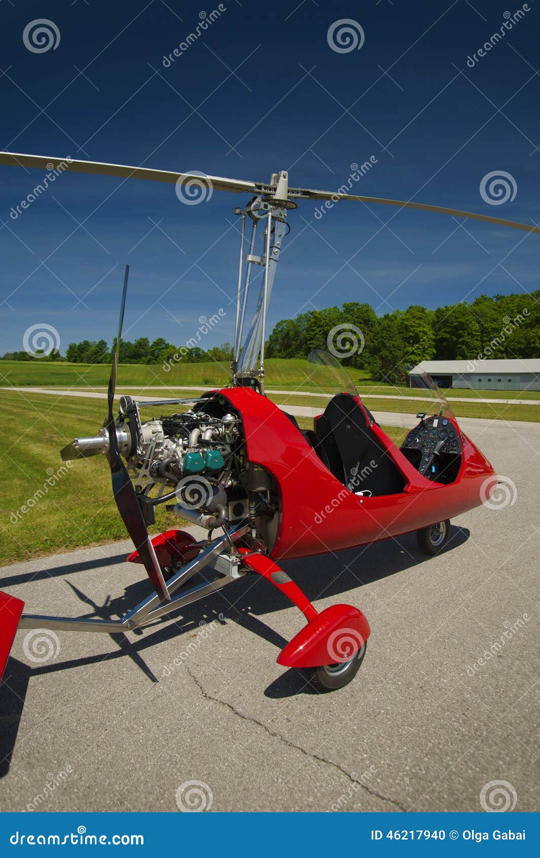 Red open-cockpit autogyro stock photo. Image of asphalt - 46217940