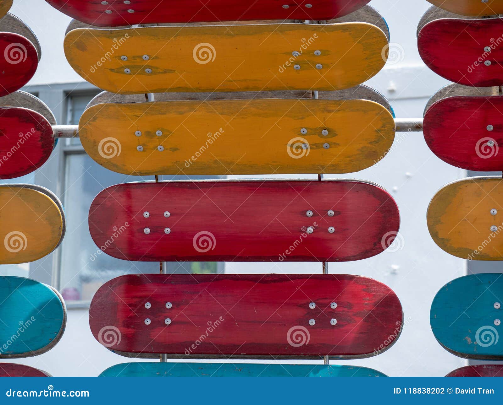 Red and Orange Skateboard Decks Mounted on a Structure Stock Photo ...