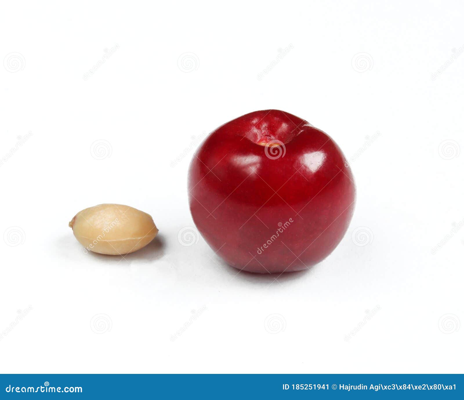 Red Organic Cherry and Seed Separated and Isolated on White Background ...