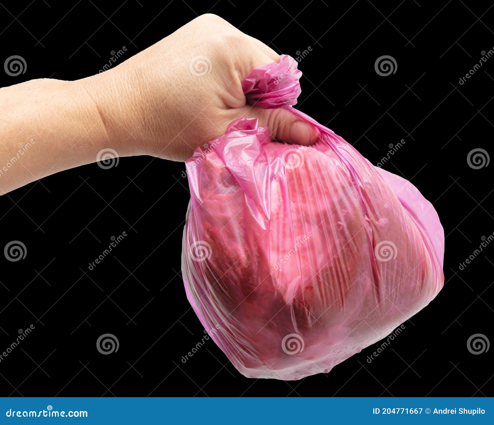 Red Package with Meat in Hand Isolated on Black Stock Image - Image of ...