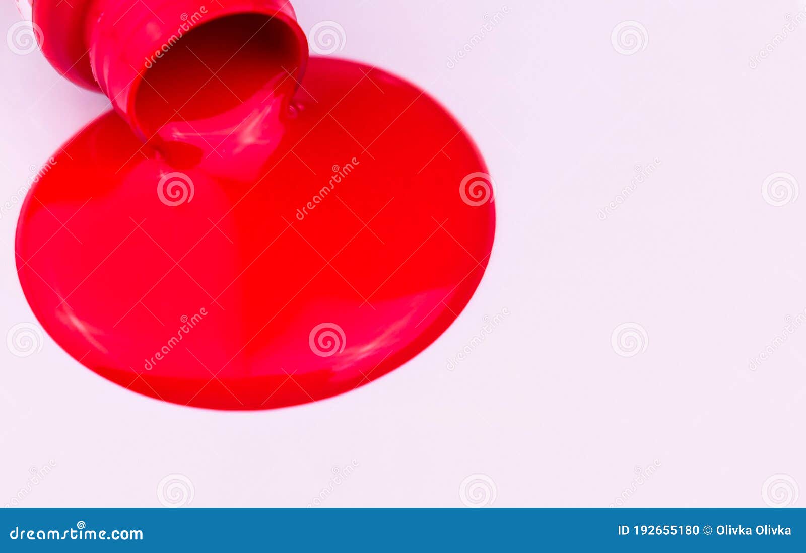 Red Paint Spills from a Bottle on a White Background.Copy Space. Stock ...