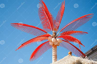 Red palm tree stock photo. Image of outdoor, sunny, roofs - 11416756
