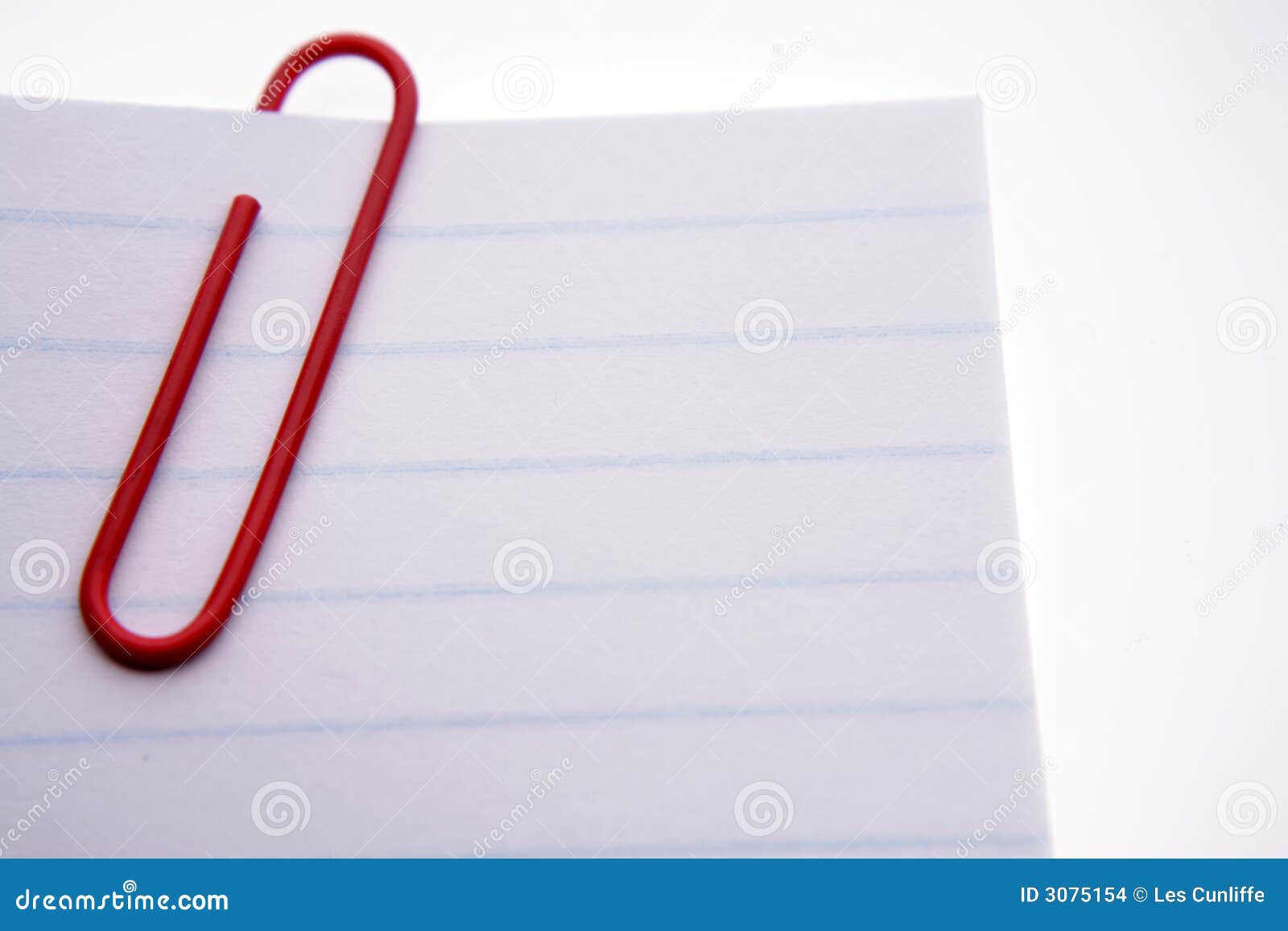 Red paper clip on papers stock photo. Image of background - 3075154