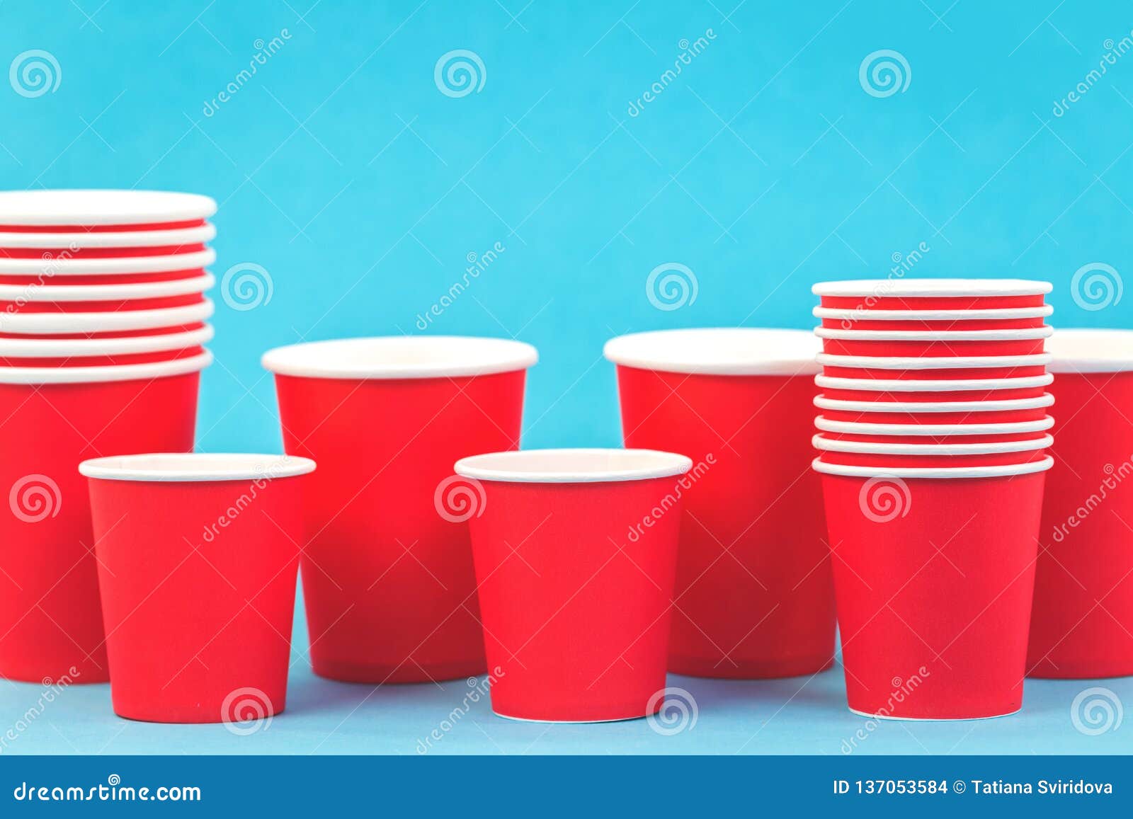Red Paper Cups Rows on Blue Background Stock Photo - Image of green ...