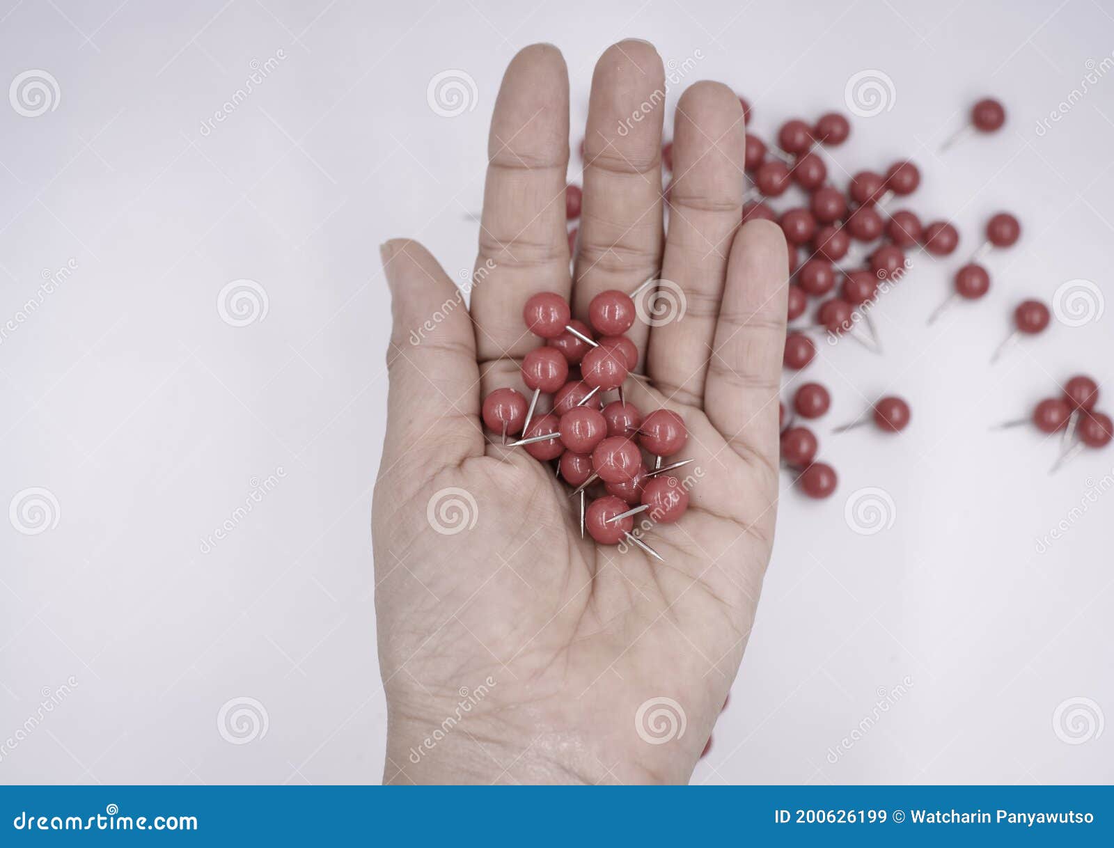 Red Paper Pin in Human Hand,Thumbtack Stock Image - Image of plastic ...