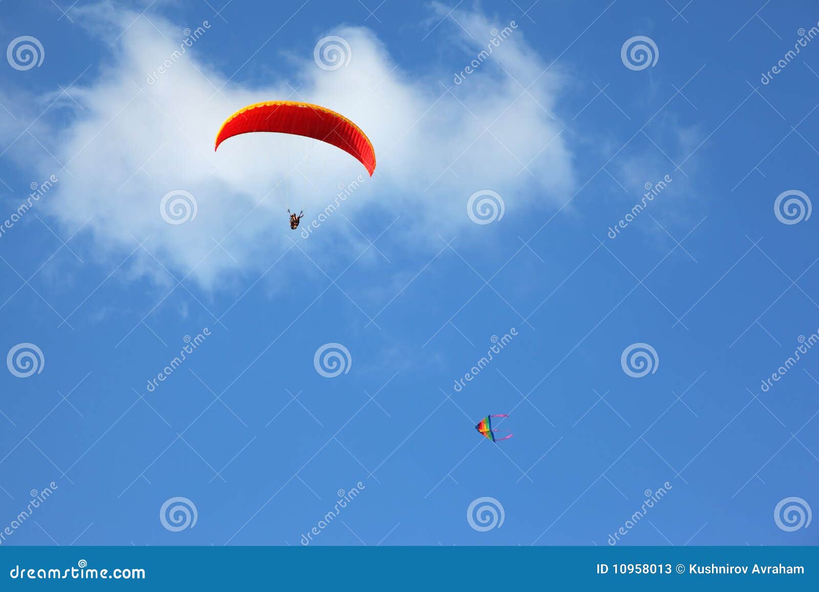 The Red Parachute Flies in the Blue Sky Stock Image - Image of ...
