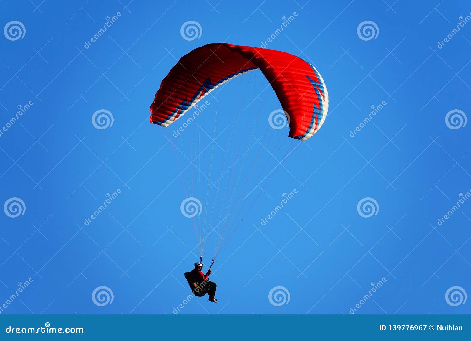 Red Paraglider in a Blue Sky Editorial Photography - Image of happiness ...