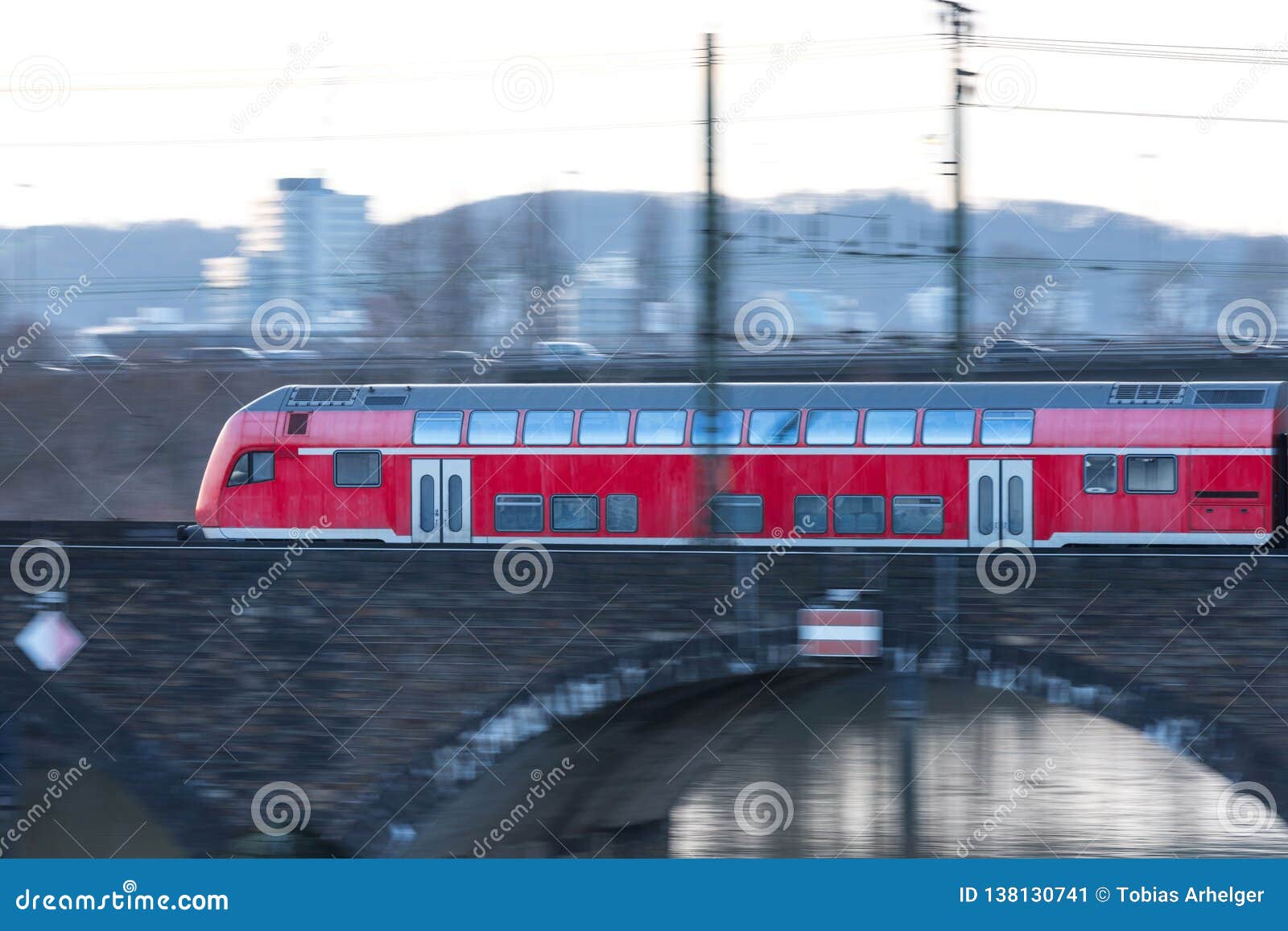 Red Passenger Train Speeding on a Bridge Stock Image - Image of sped ...