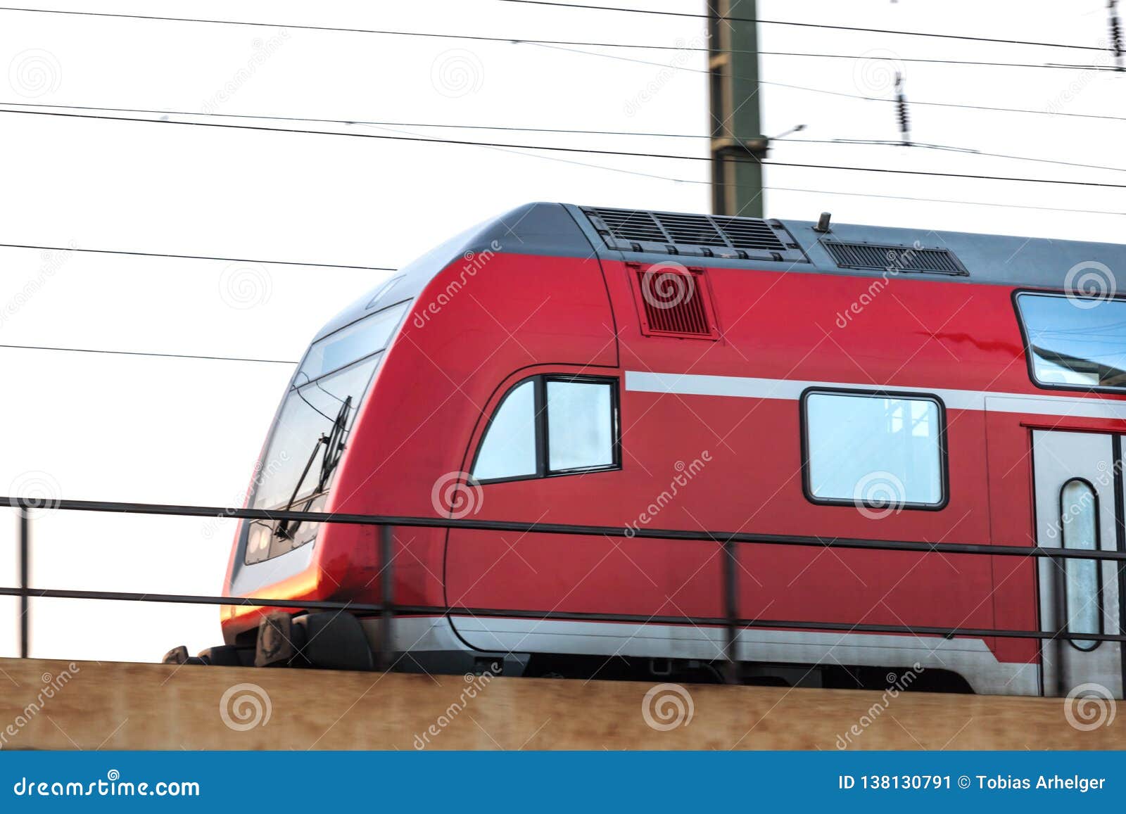 Red Passenger Train Speeding on a Bridge Stock Image - Image of windows ...