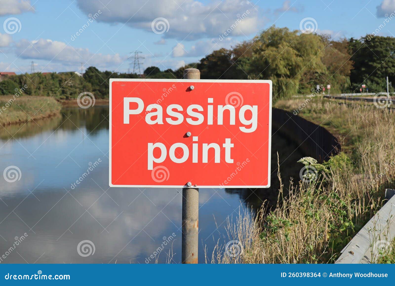 A Red Passing Point Sign by the Side of the River Exe Near Exeter in ...