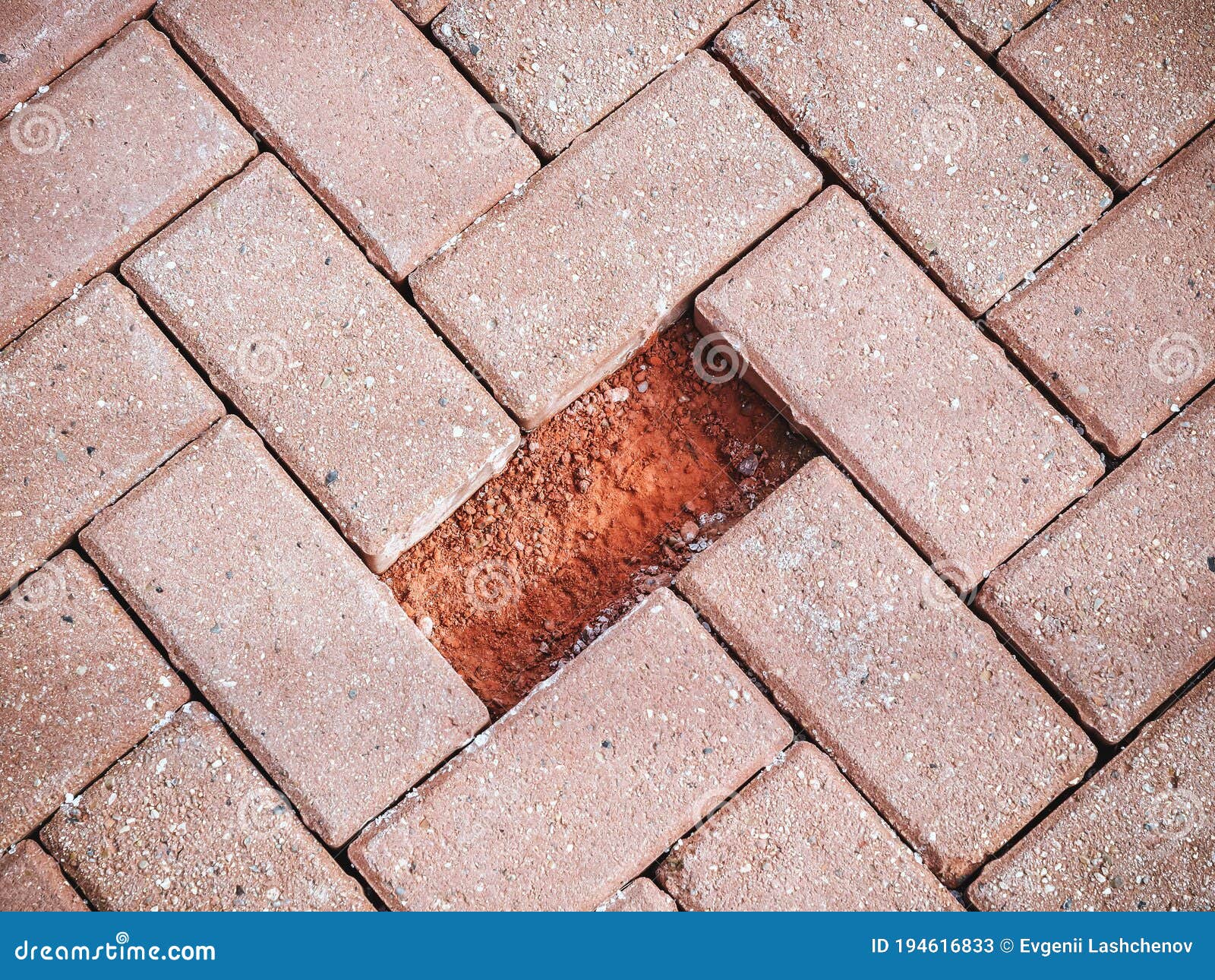 Red Paving Slabs with One Missing Piece. Close-up Photo Stock Image ...