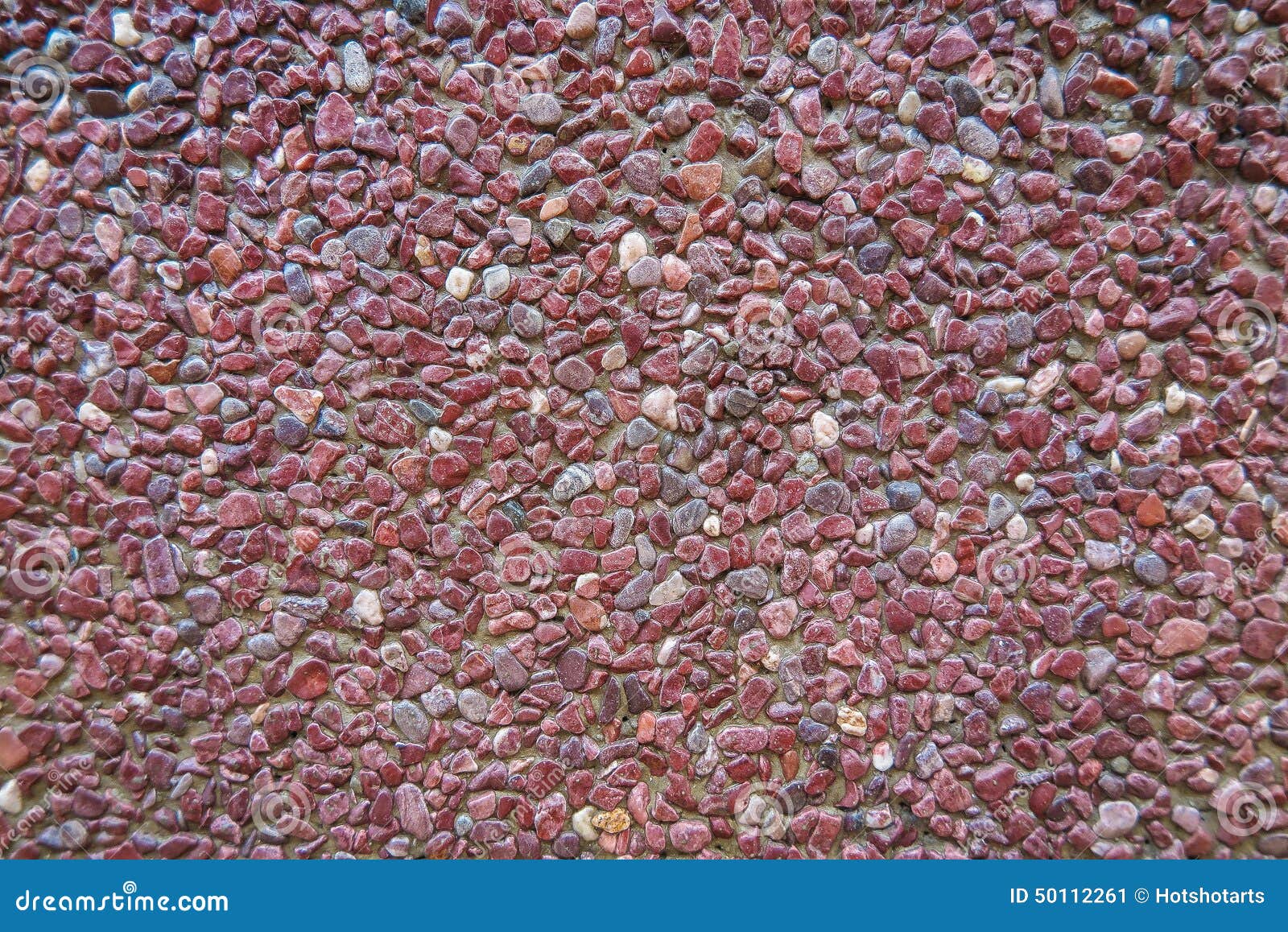 Red pebble wall stock image. Image of skies, sunny, commercial - 50112261