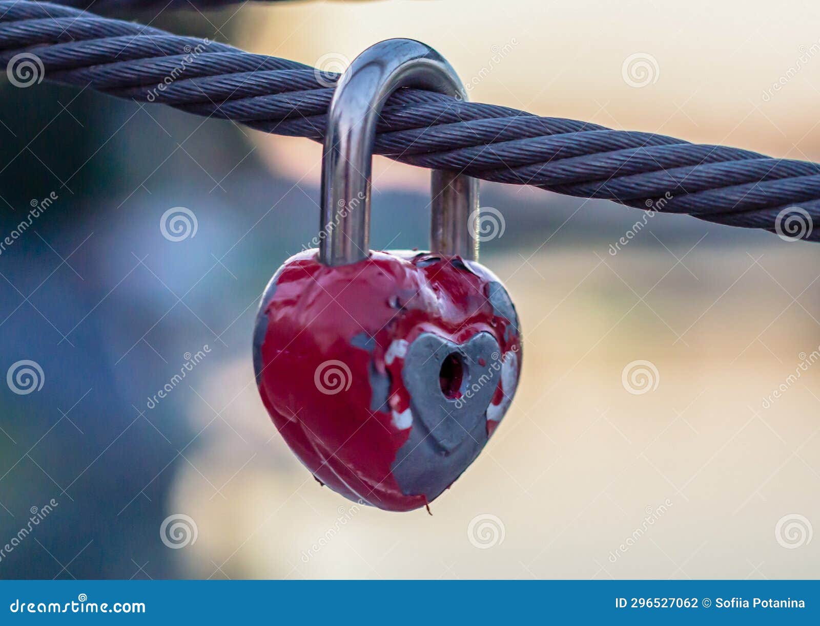 Red Peeling Wedding Lock on a Rope with a Key Hole Stock Photo - Image ...
