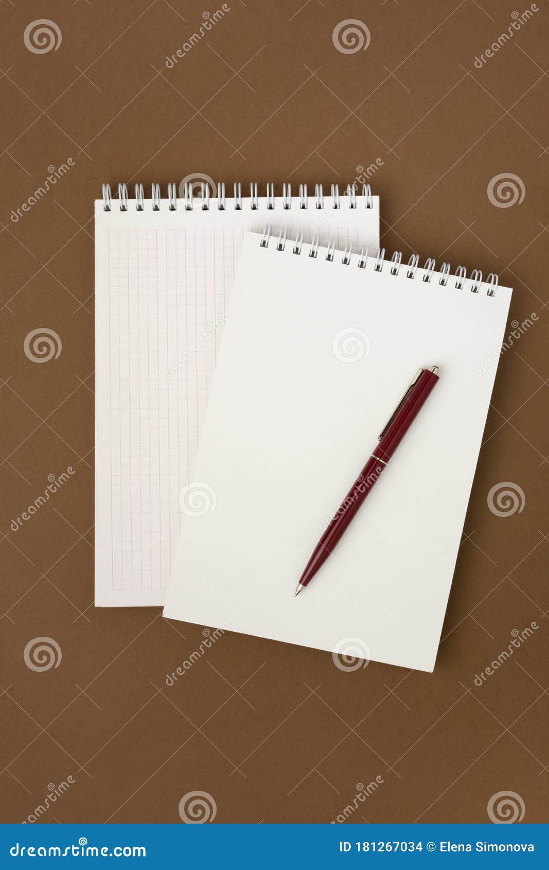 Red Pen on Two Blank White Spiral Notebooks on Brown Surface Stock ...