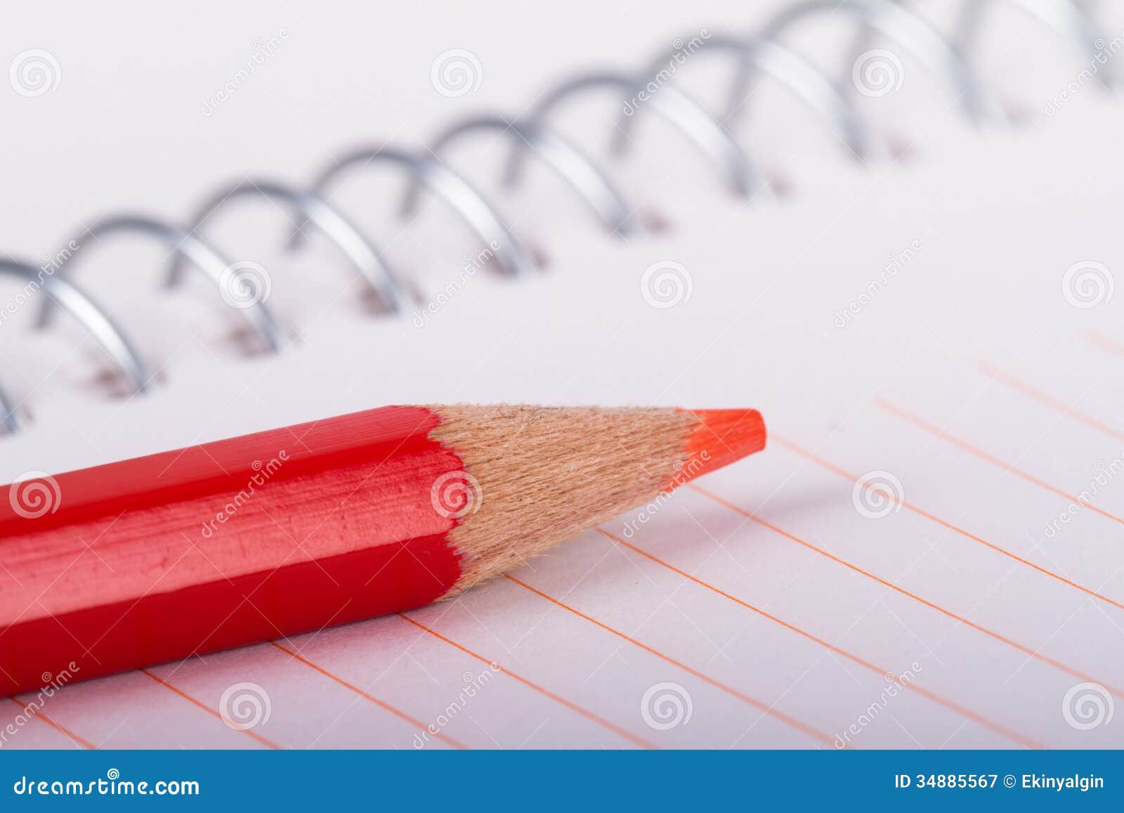 Red Pencil on Notebook stock image. Image of handwriting - 34885567