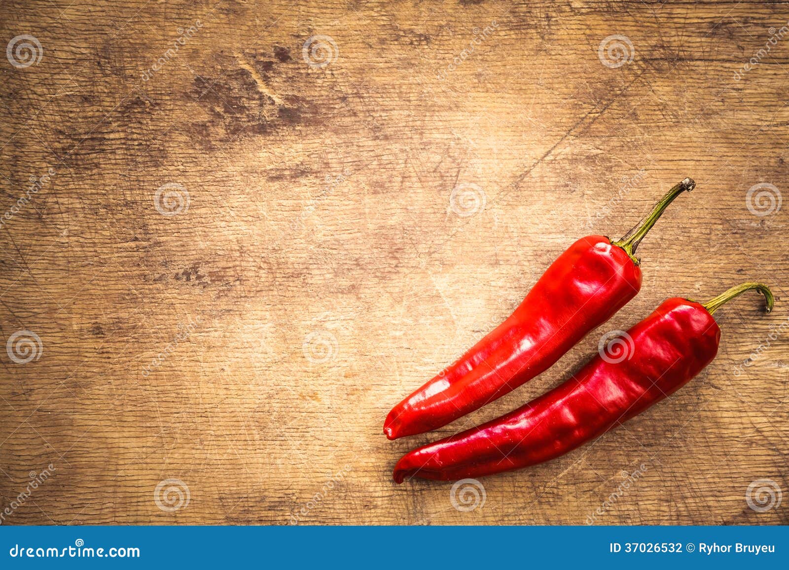 Red Peppers on Old Wooden Table Stock Photo - Image of macro, cook ...