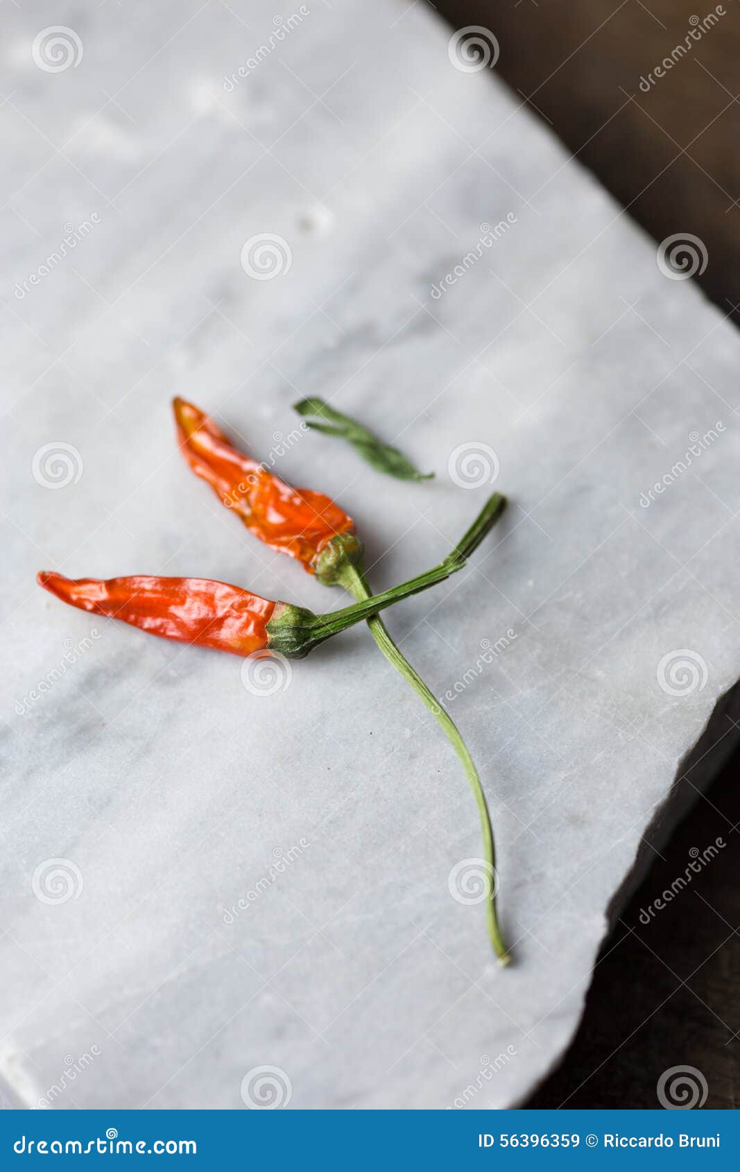 Red Peppers on White Marble Stock Image - Image of healthful, gold ...