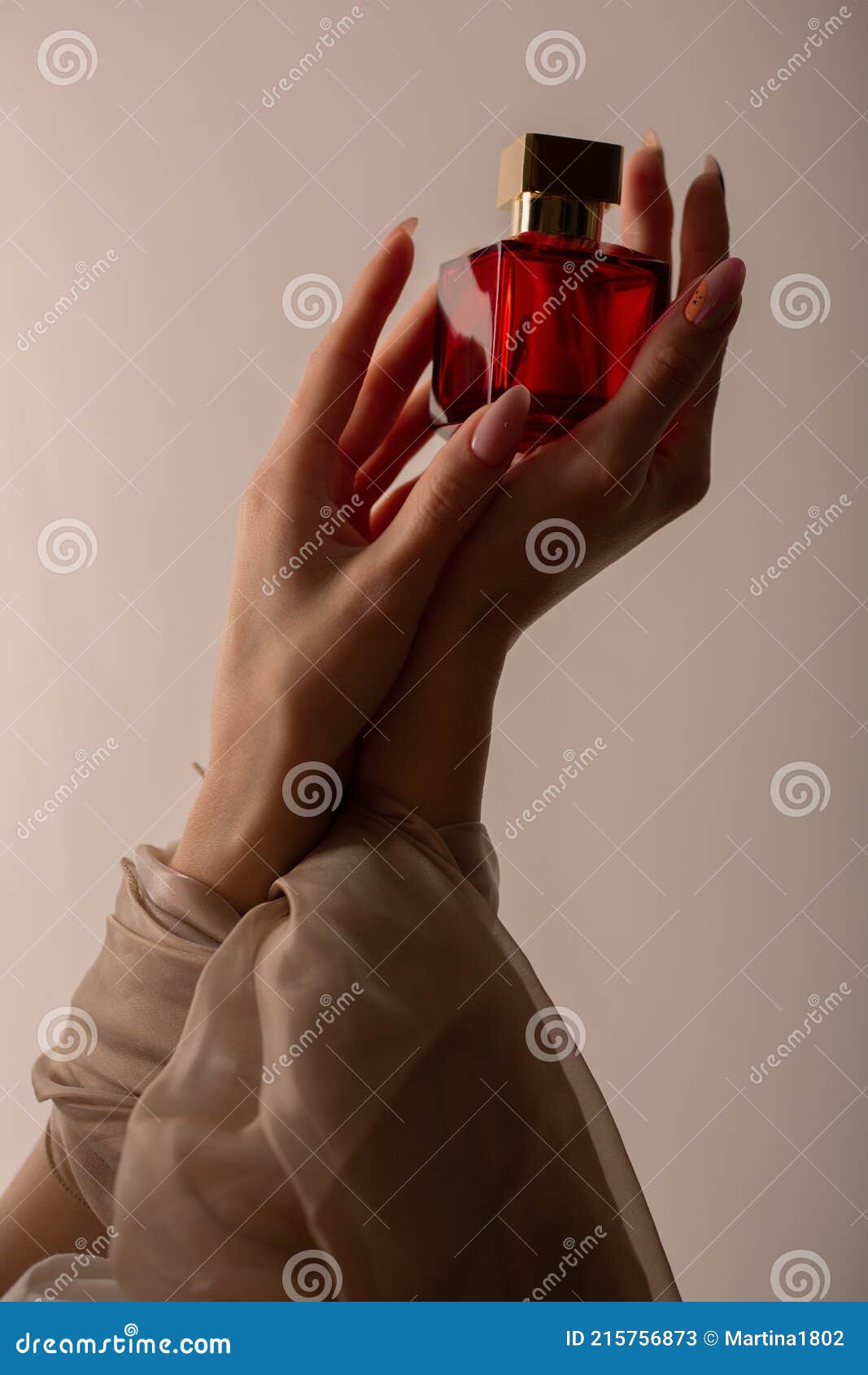 Red Perfume in a Beautiful Female Hand Stock Image - Image of smell ...