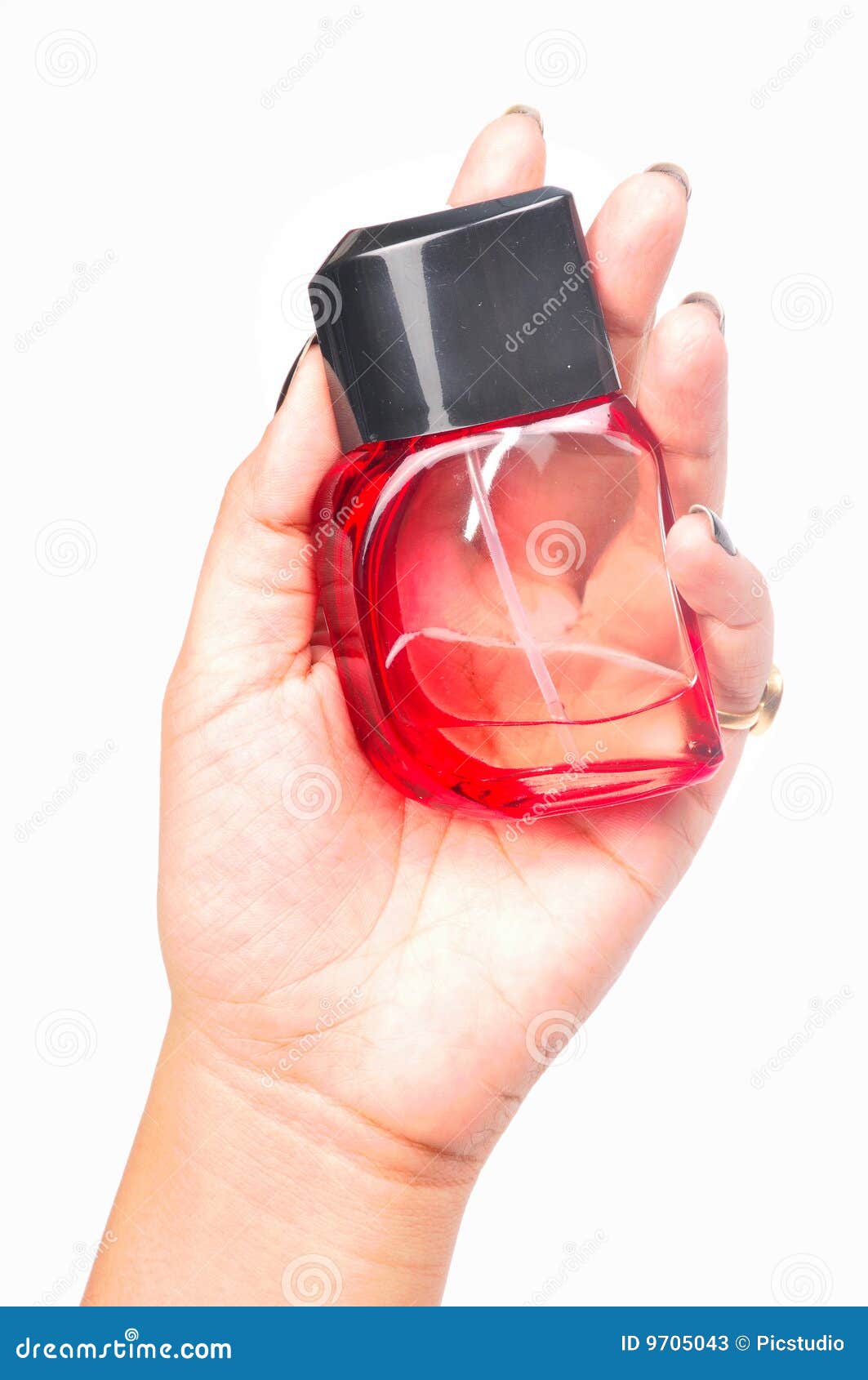 Red perfume bottle stock image. Image of cosmetics, hand - 9705043