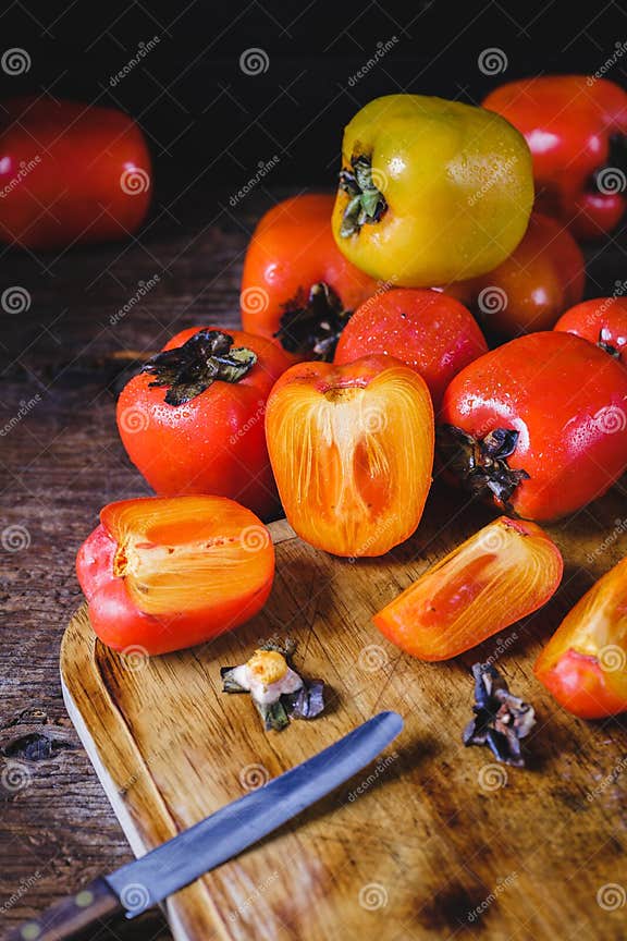 Red Persimmons stock photo. Image of sweet, slice, farm - 83278086