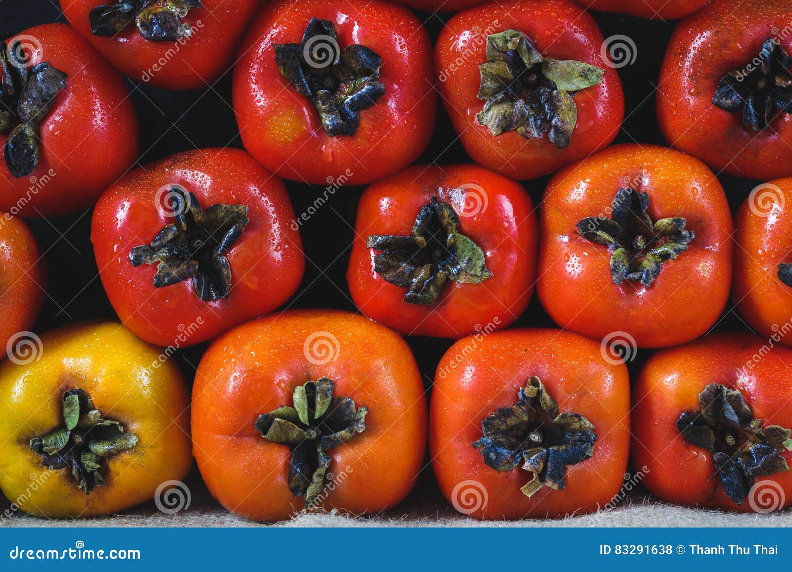 Red Persimmons stock photo. Image of cuttingboard, nature - 83291638