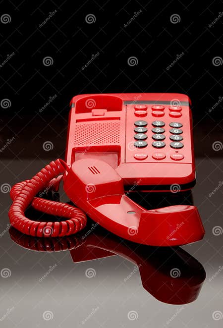 Red phone on black glass stock photo. Image of still, numbers - 3490660