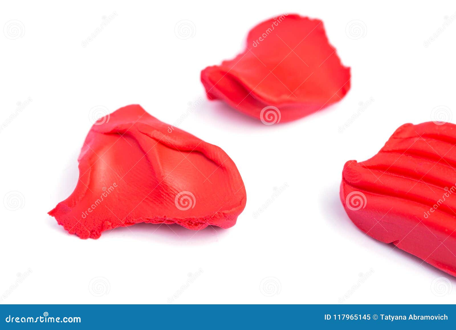 Red Pieces of Plasticine on a White Background. Stock Image - Image of ...