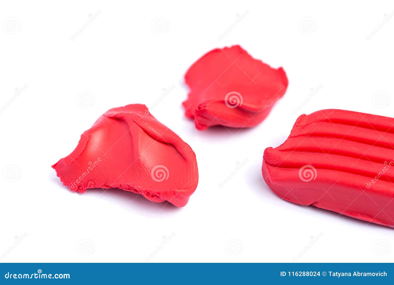 Red Pieces of Plasticine on a White Background. Stock Photo - Image of ...