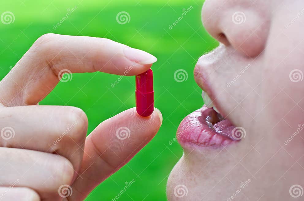 Red pill stock image. Image of healthy, eating, mouth - 26961179