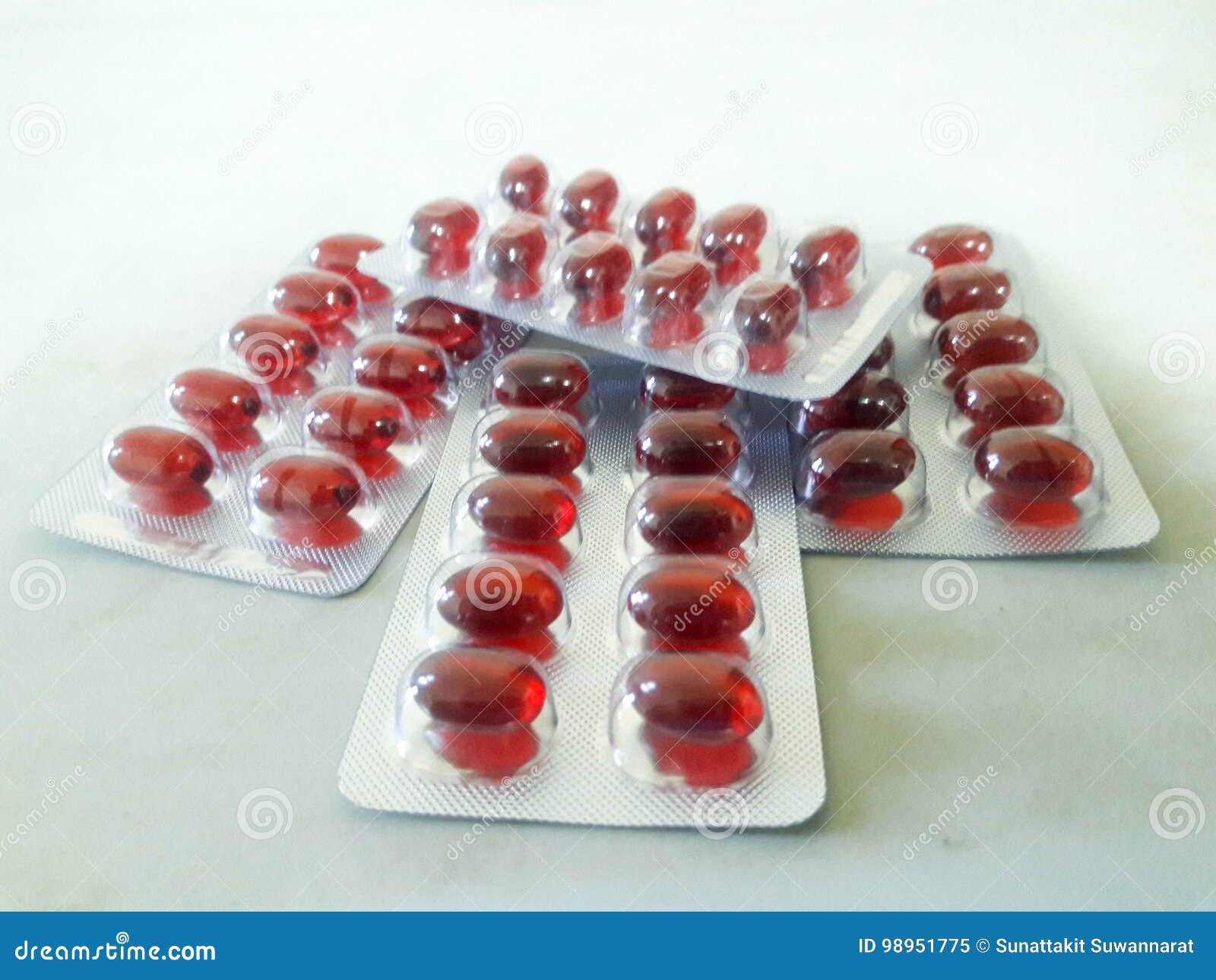 Red pill in pack stock image. Image of package, background - 98951775