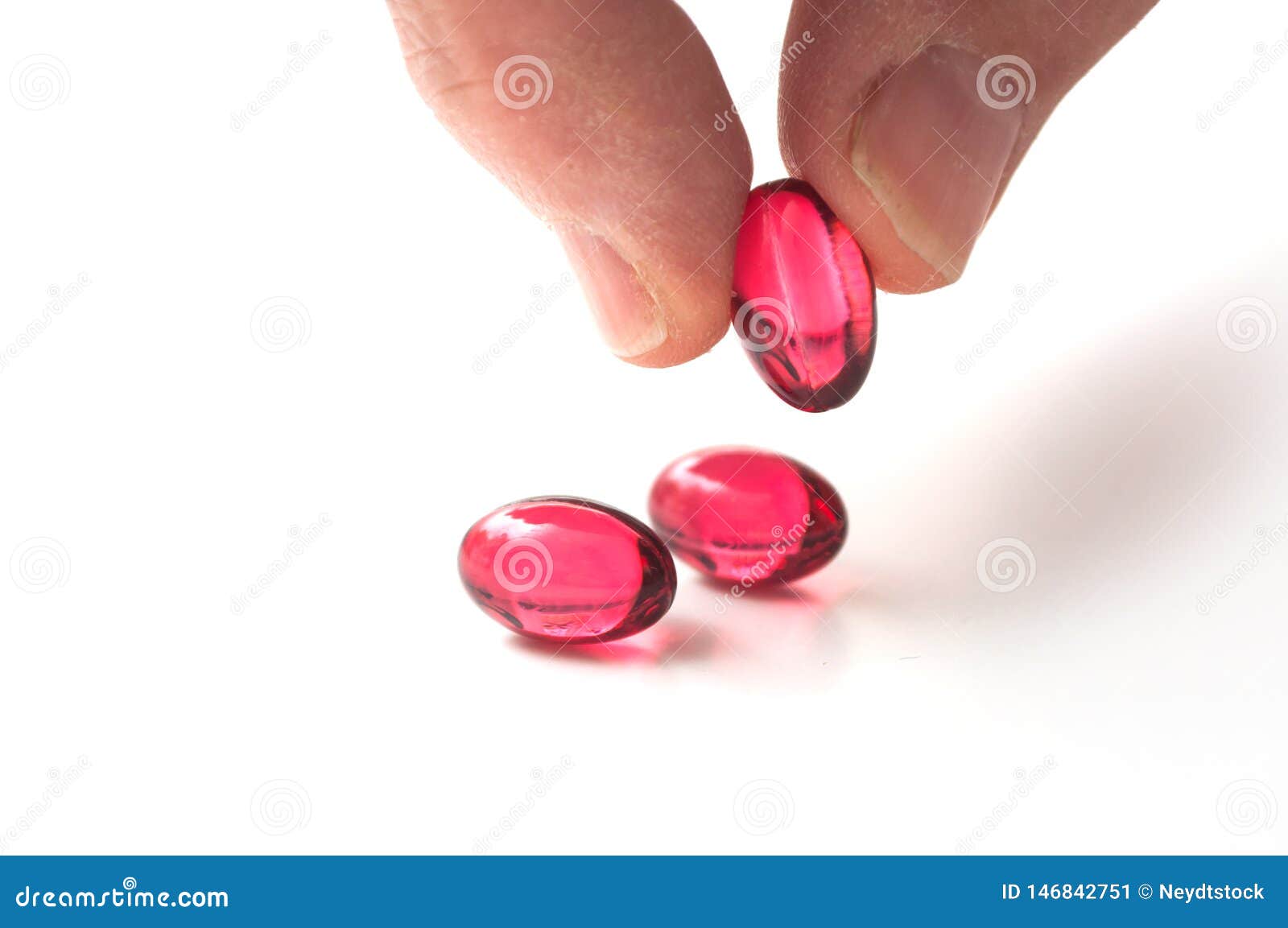 Red Pills in Hand on White Background Stock Image - Image of palm ...