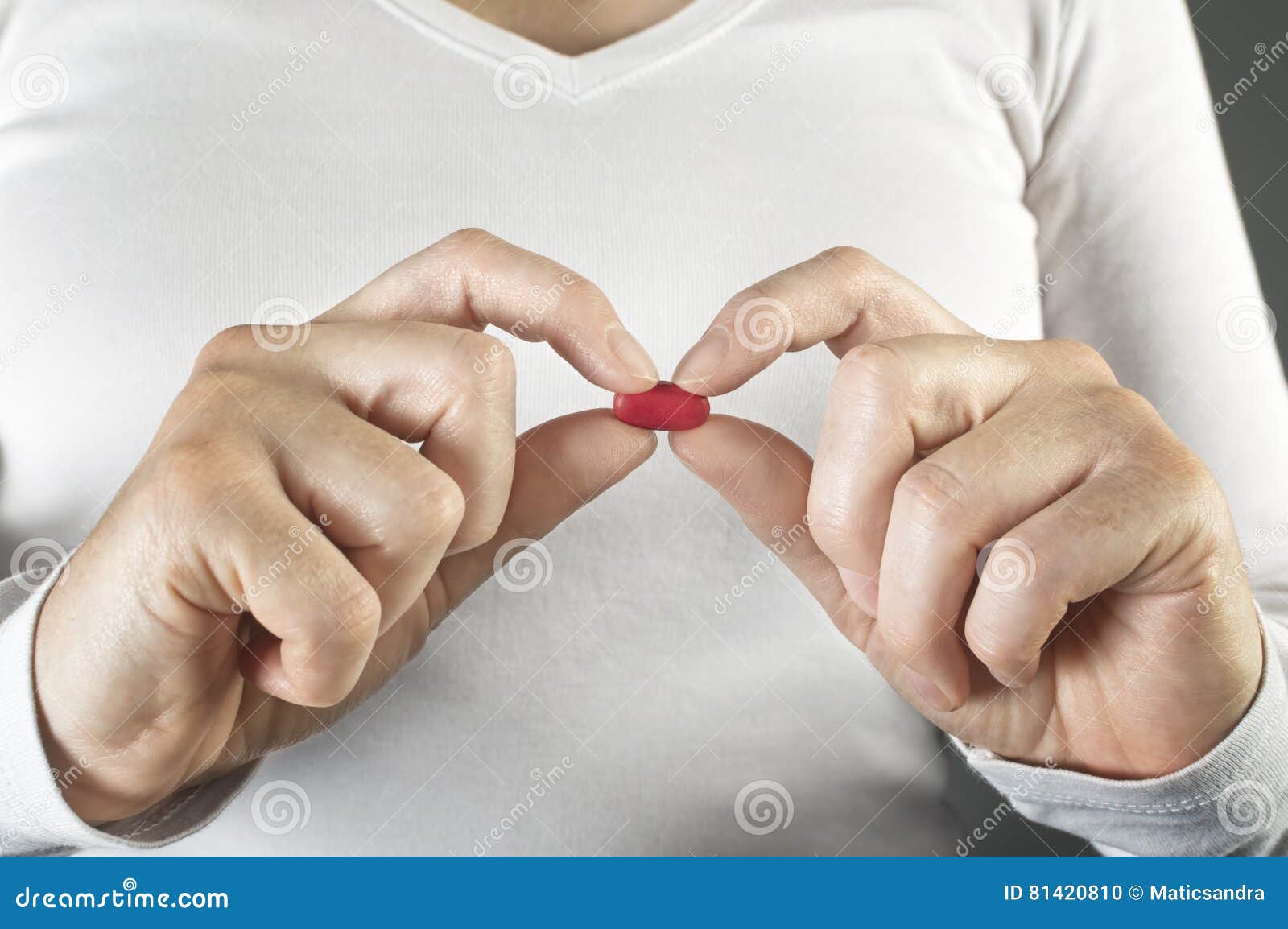 Red pills in woman hands. stock photo. Image of healthcare - 81420810