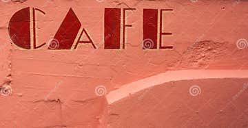 Red on pink cafe sign stock image. Image of seas, wall - 59337995